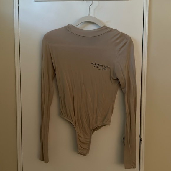 PrettyLittleThing | Tops | Pretty Little Thing Tan Graphic Bodysuit ...